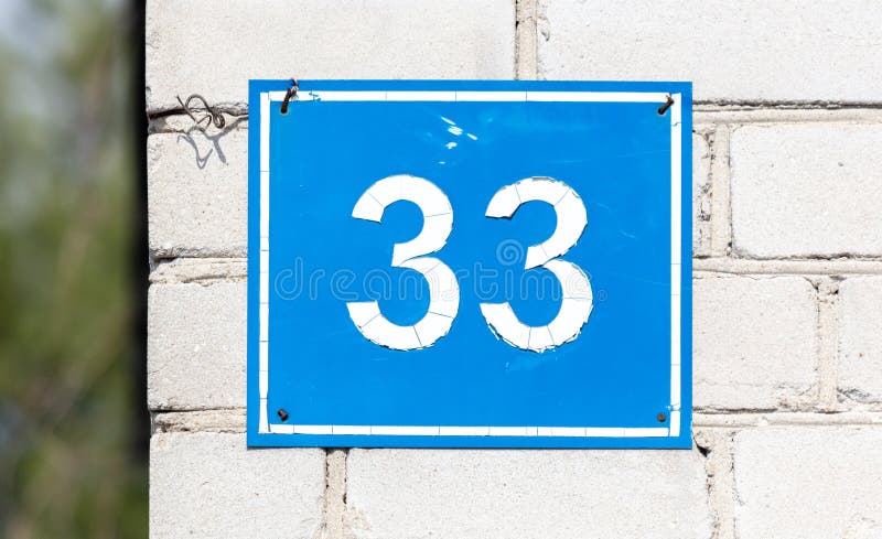 The Number 33 on the Plate of the House Stock Image - Image of ...