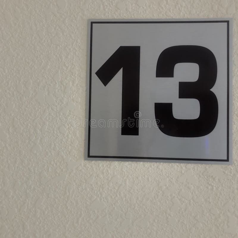 Number 13 Plate on White Wall Stock Photo - Image of vintage, outside ...