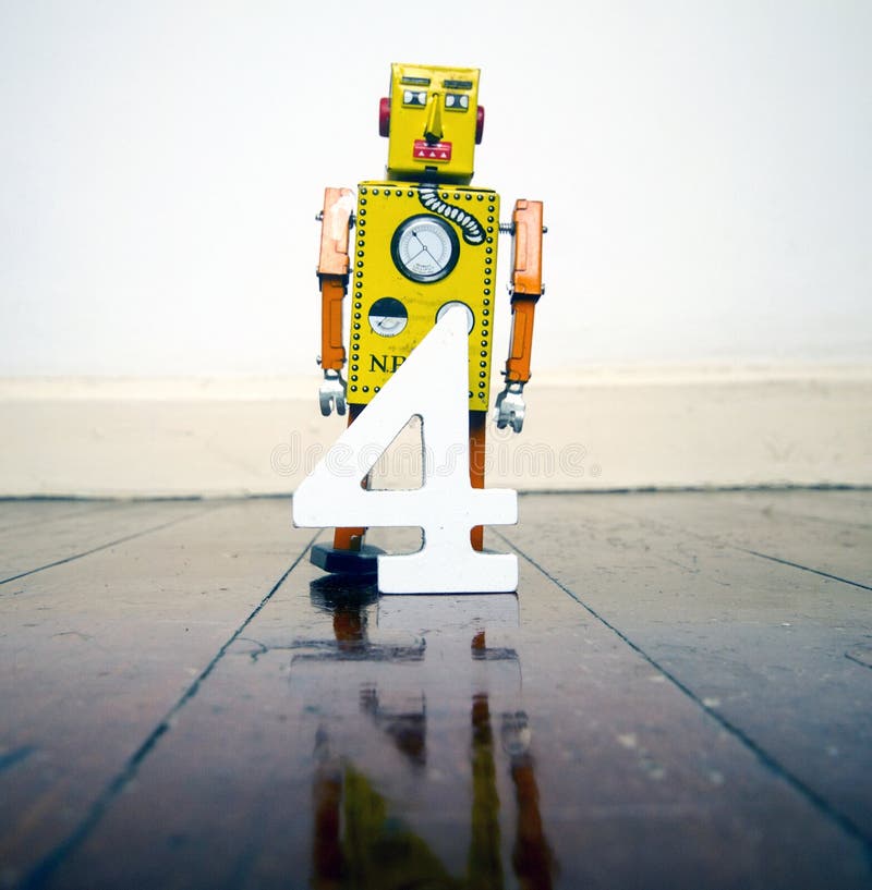 Number 5 Robot Toy on a Woden Floor Silver Stock Photo - Image of ...