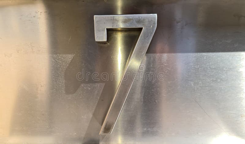 Number Seven As a Street Number Indicator on the Wall Stock Image ...