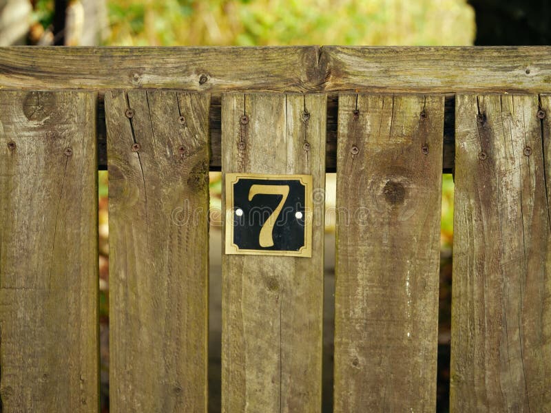 Number Seven on a House Gate Post Stock Image - Image of fence, fruit ...