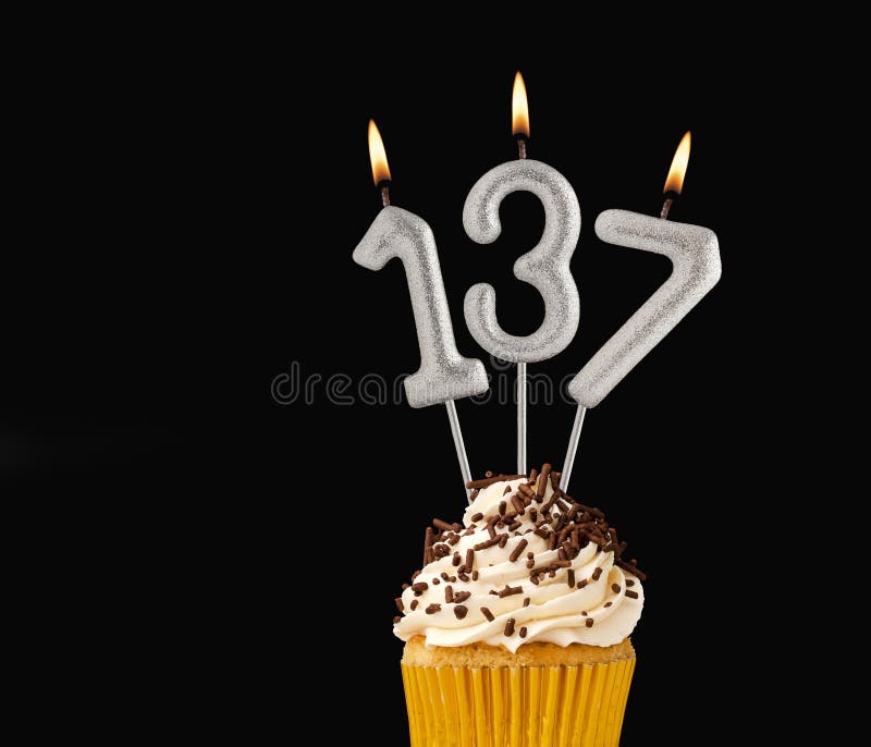 Number 137 Shaped Candles - Birthday Cupcake on Black Background Stock ...