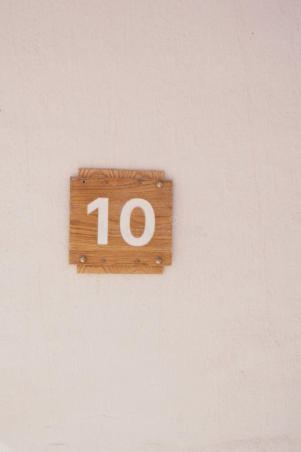 Number 10 Sign Mounted on a Wall in a Simple Setting Stock Image ...