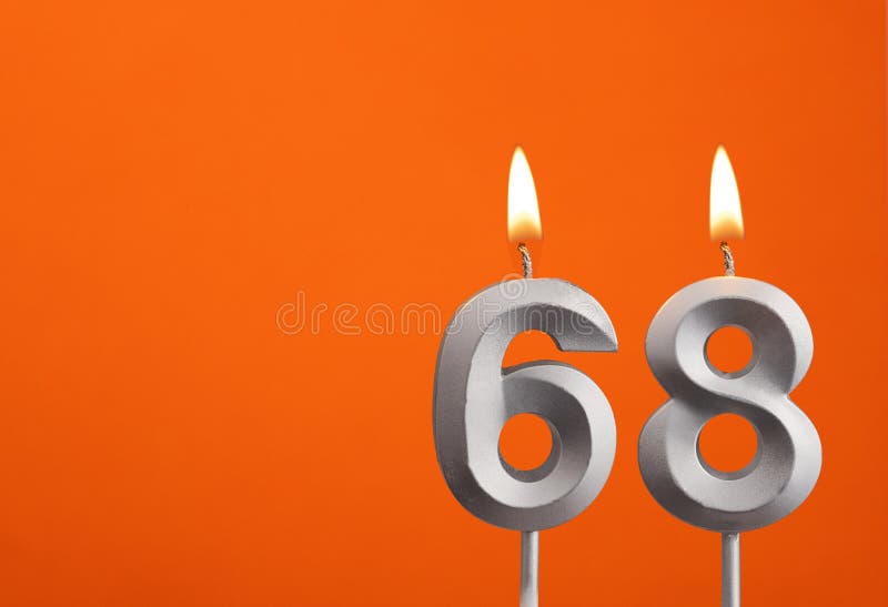 Number 68 - Silver Anniversary Candle on Orange Background Stock Image ...
