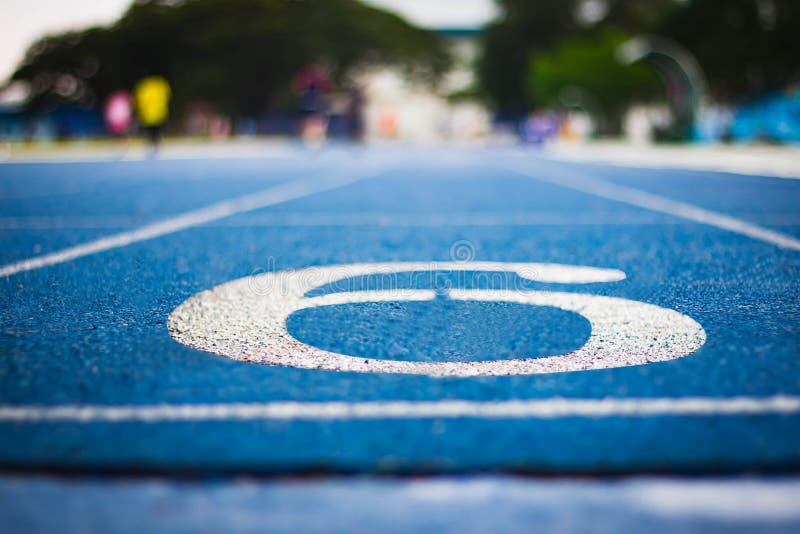 Number Six on the Start of a Running Track .Blue Treadmill with ...