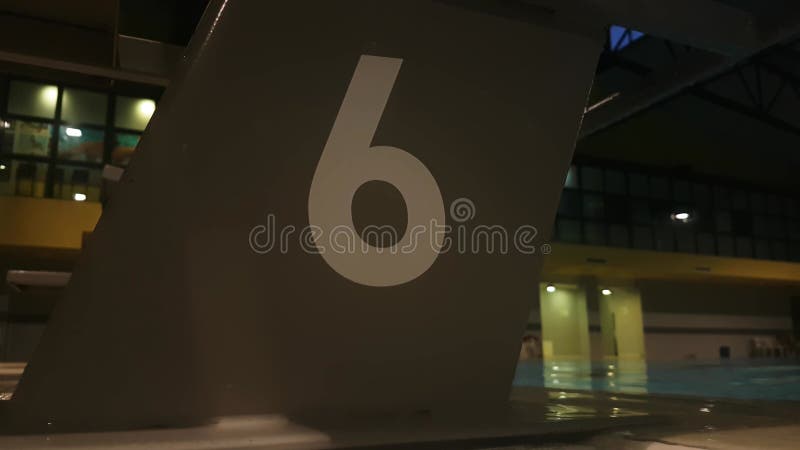 Number Six on Swimming Pool Jumping Platform. 6th Track Position Close ...