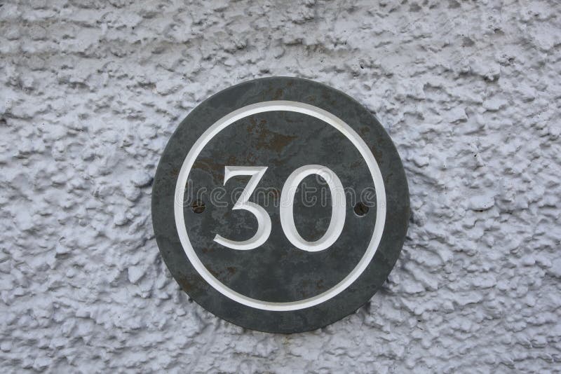 Number 30 on a slate sign stock photo. Image of sign - 158440524