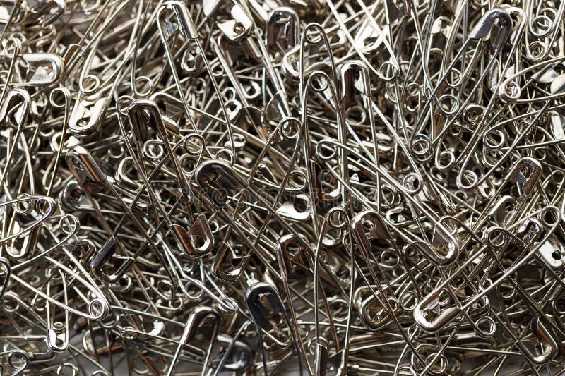 A Number of Stainless Safety Pins on White Background Stock Image ...