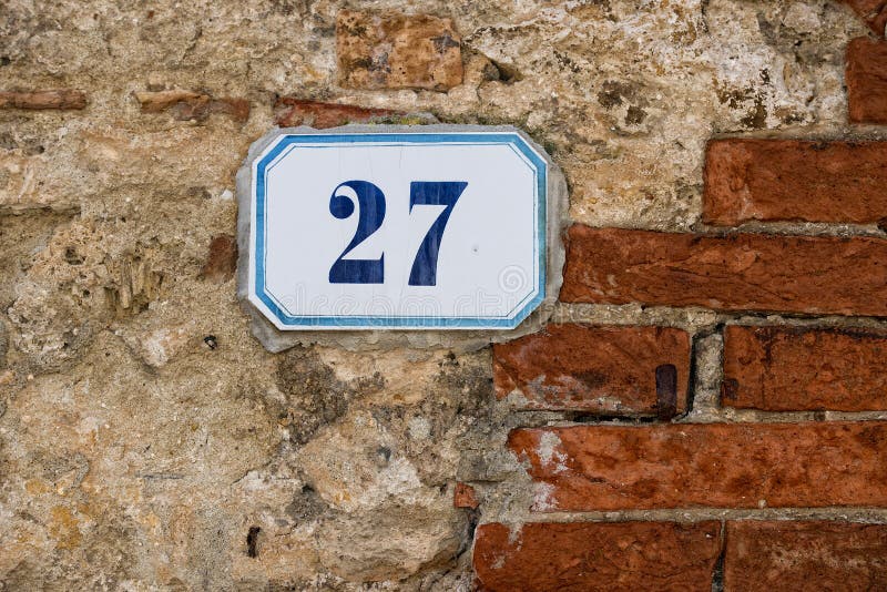 Number 27 on Stone and Brick Wall Background Stock Photo - Image of ...