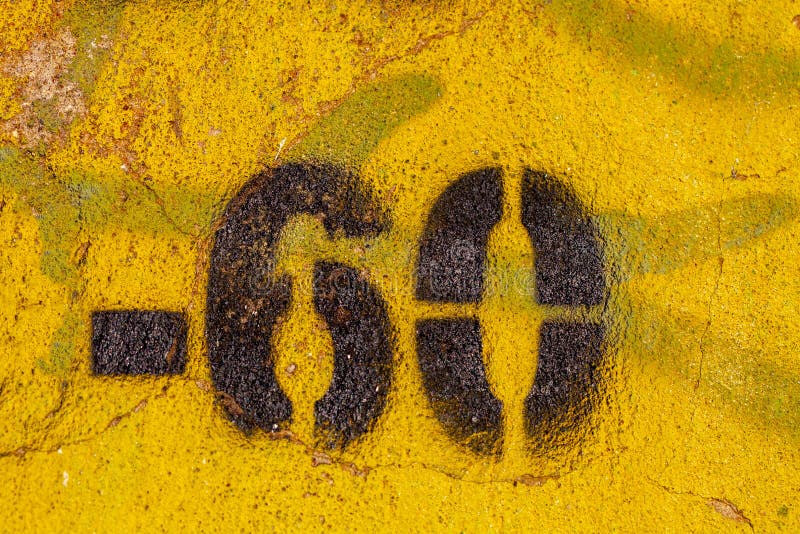 Number 60 on a stone wall stock image. Image of paint - 184117861