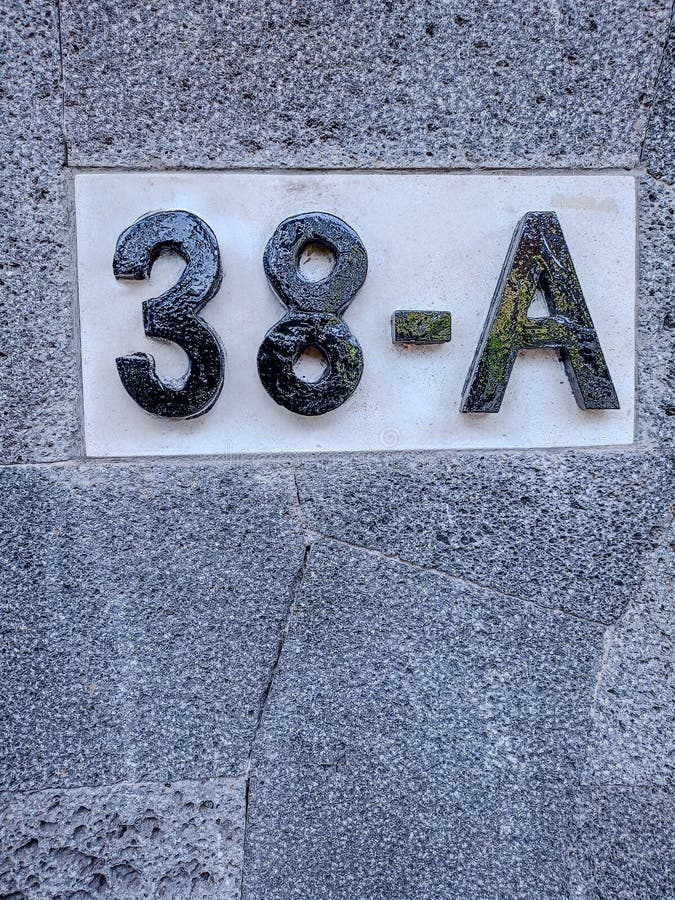 Number 38 a on the Stone Wall Stock Photo - Image of numbers, texture ...