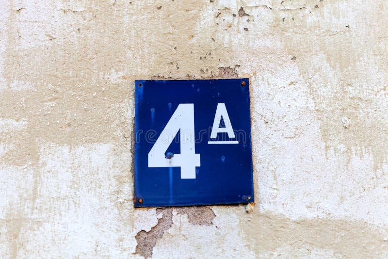 Number 4 on a Stone White Wall Stock Image - Image of brick, black ...