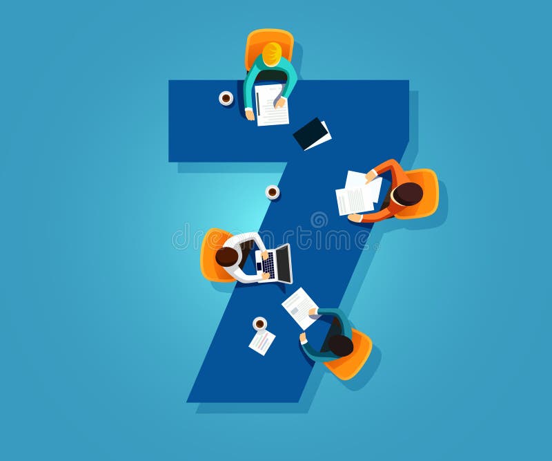 Number 7. Team Works Together at a Table in the Shape of the Number ...