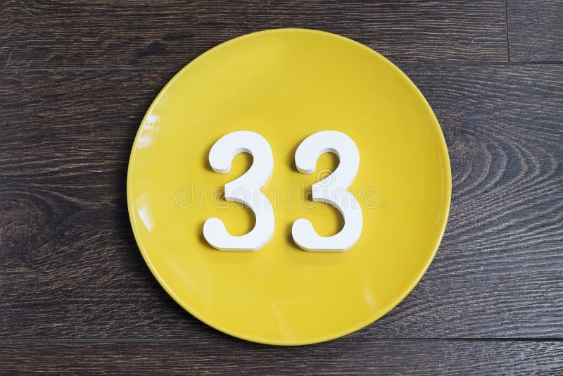 The Number Thirty-three on the Yellow Plate Stock Image - Image of ...