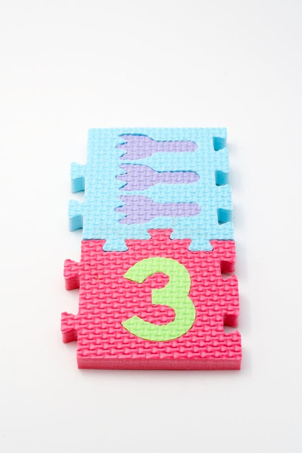 Number Three Puzzle Mats. Focus on the Front (small DOF) Stock Photo ...