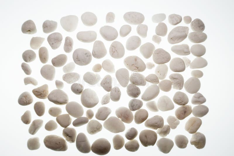A Number of Tiny White Stones from Nature, Many Laid on White Areas ...
