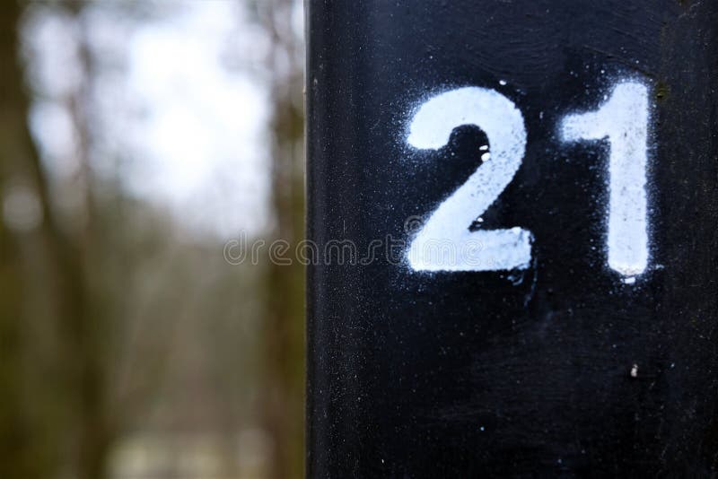 Number Twenty-one Sprayed with White Paint on Black Background Stock ...