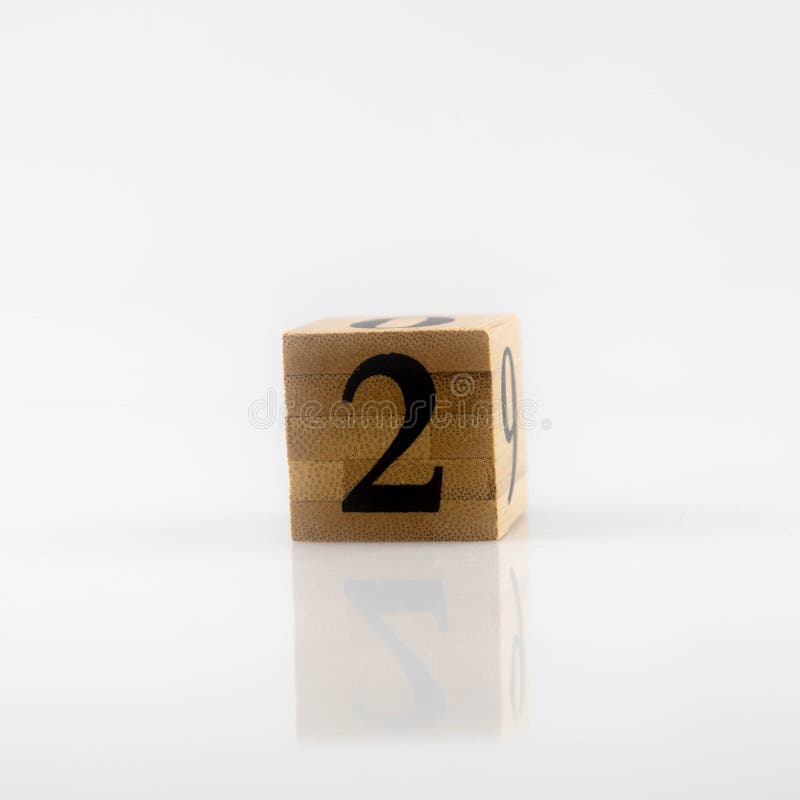 Number 2 Two Wooden Cube with Number Isolated in White with Reflections ...