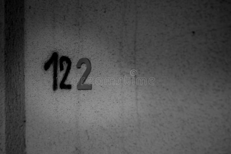 The Number on the Wall is One Hundred Twenty Two or 122 Stock Image ...
