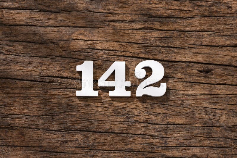 Number 142 - Piece on Rustic Wood Background Stock Photo - Image of ...