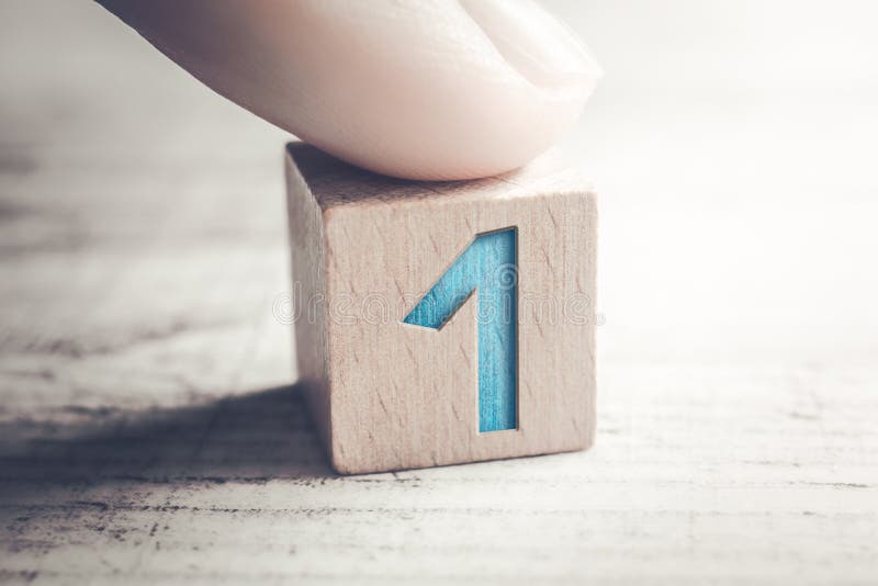 Number 1 on a Wooden Block on a Table Stock Image - Image of analog ...
