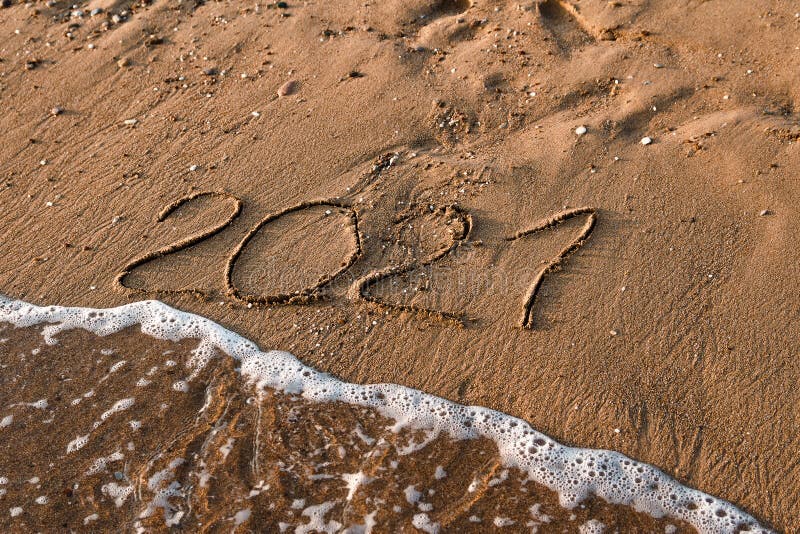 Number 2021 is Written on the Sand at Sea. Sand. 2021 Stock Image ...