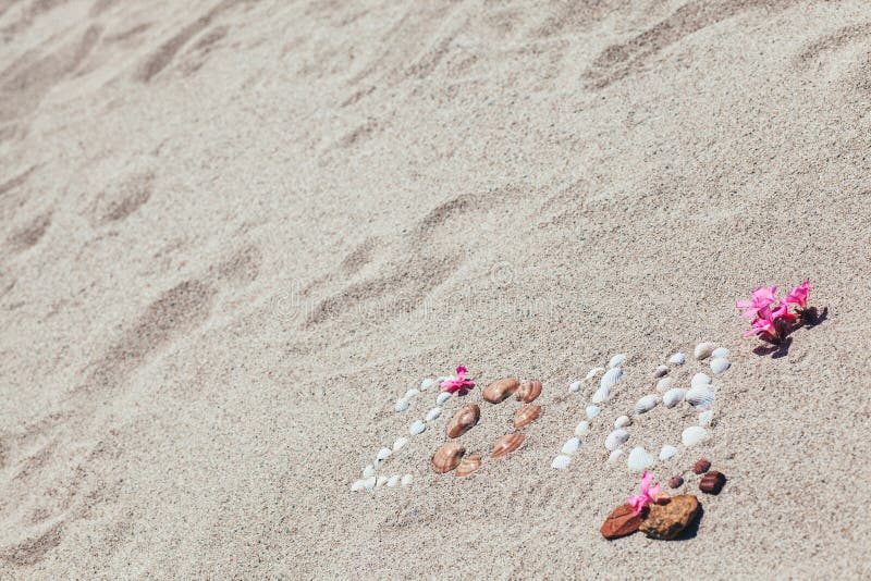 Number 2018 Written with Shells Stock Photo - Image of season, number ...