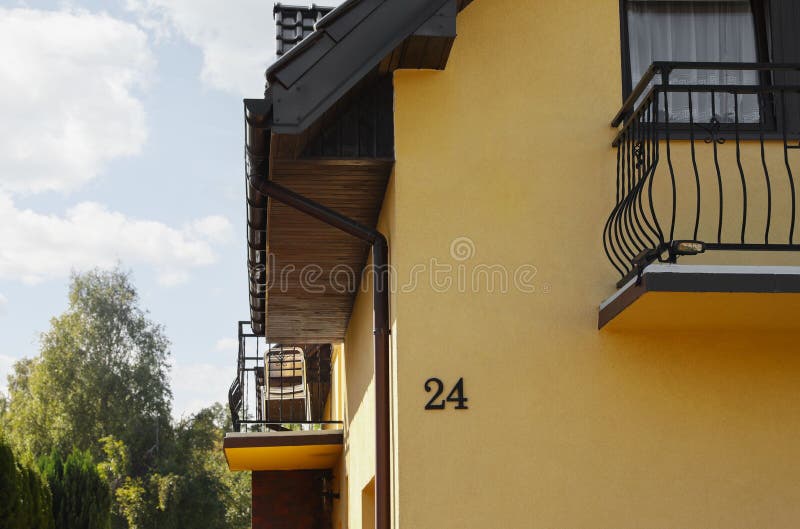 Number 24 on Yellow House with Balconies Outdoors Stock Illustration ...