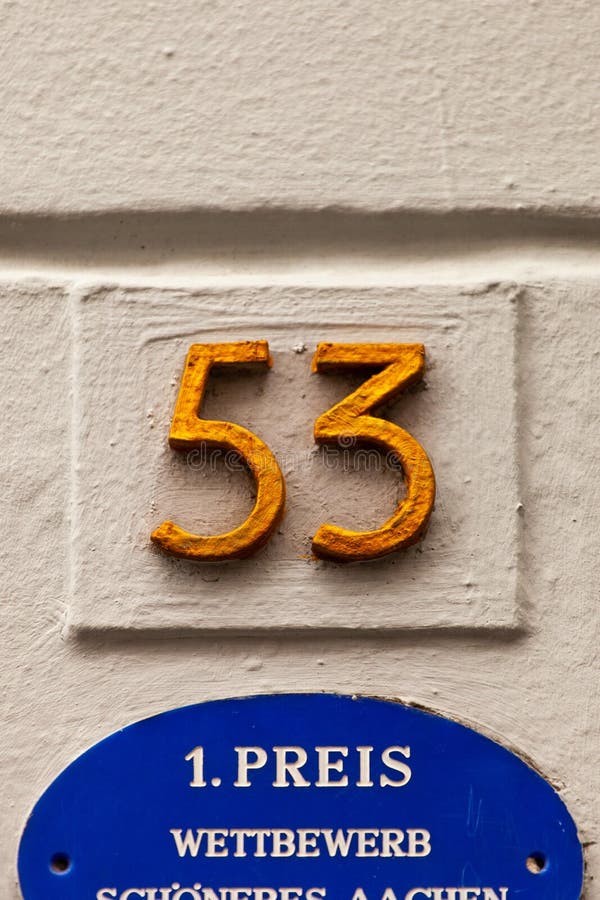 Number 53 Yellow House Number on White Wall Stock Photo - Image of ...