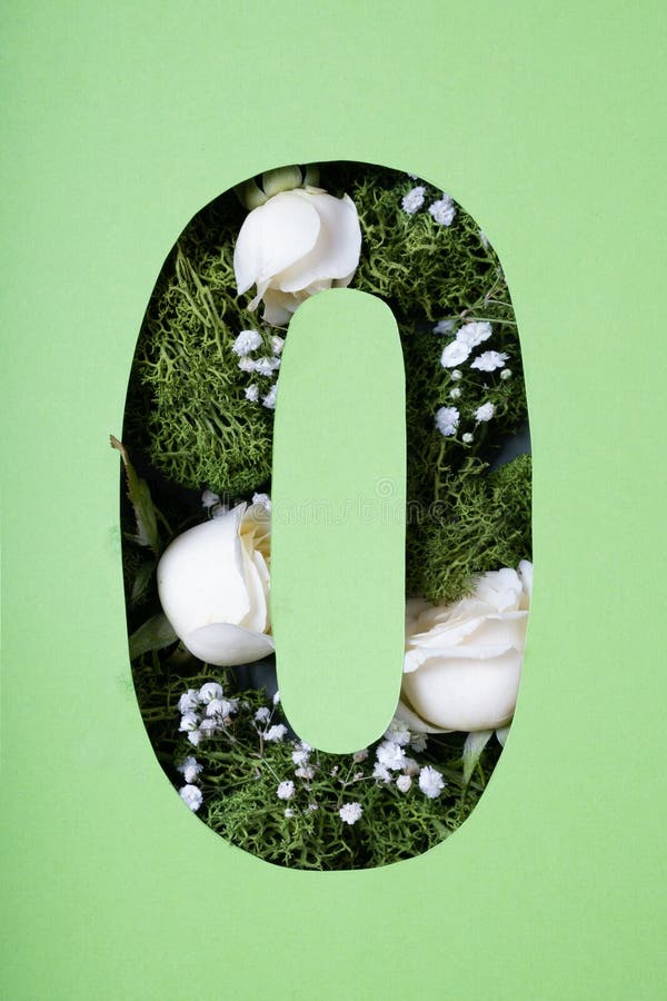 The Number 0 Zero is Cut Out of Paper with Flowers and Moss Inside ...