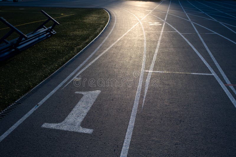 Numbered Lanes of a Track and Field Starting Point Stock Photo - Image ...