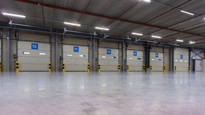Row of Numbered Loading Docks at a Warehouse Stock Photo - Image of ...