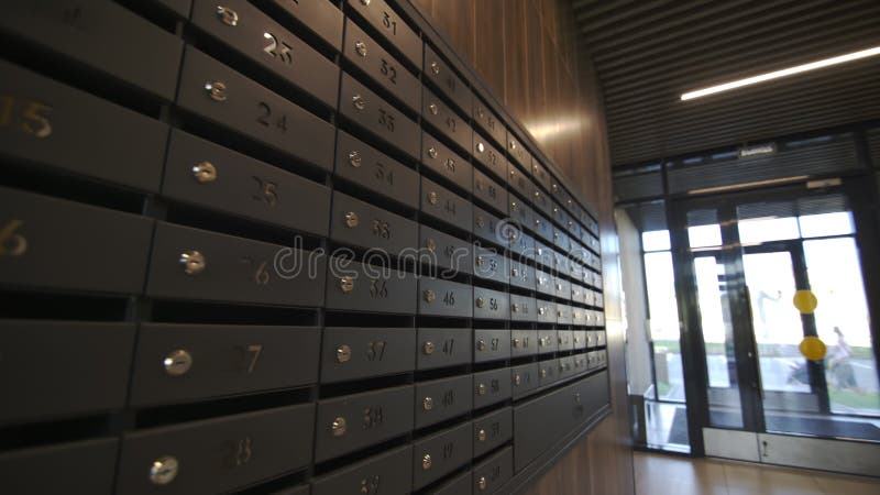 Numbered Locked Mailboxes Located in Corridor of Building Stock Footage ...
