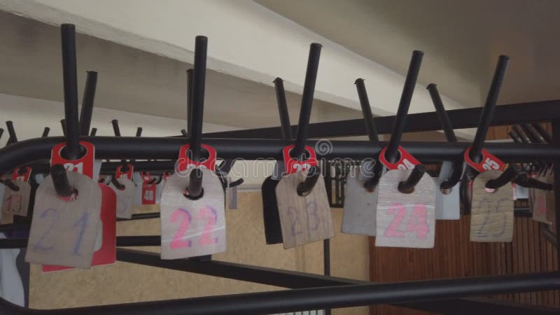 Numbers on Hangers in an Empty Dressing Room or Wardrobe Stock Video ...