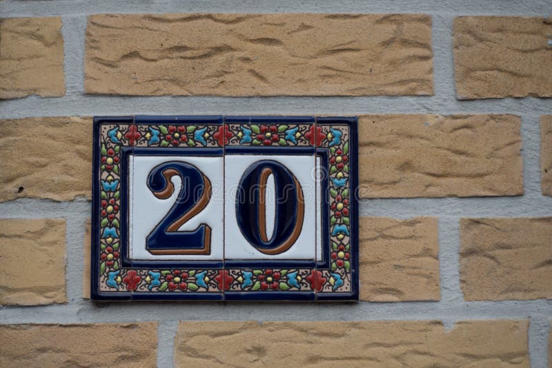 Numbers on house wall stock photo. Image of decorated - 128550654