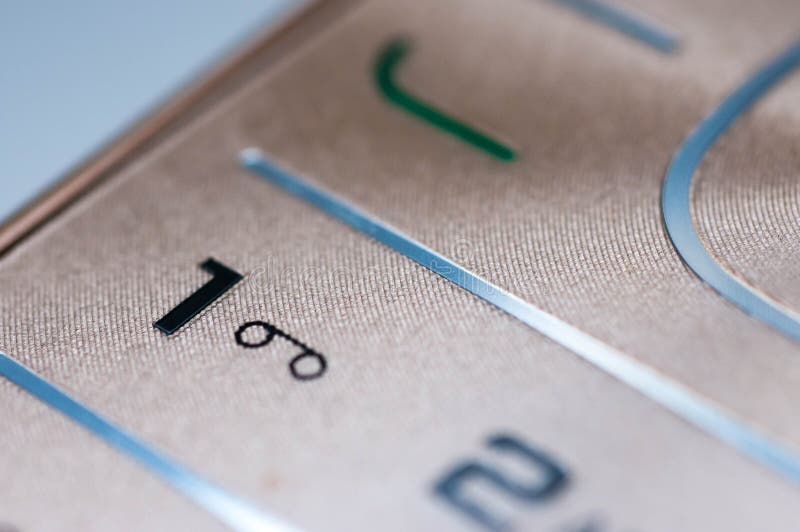 Numbers and Letters on an Old Used Golden Mobile Phone Stock Photo ...