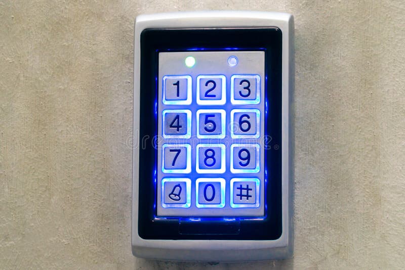 The Numeric Keypad is Mounted on the Wall. Blue Keyboard Light Stock ...