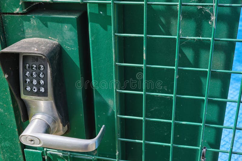 Numerical Electronic Gate Lock on Metal Gate. Stock Image - Image of ...