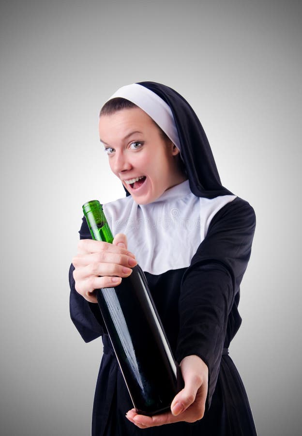 Nun with Bottle of Red Wine Stock Image - Image of person, catholic ...