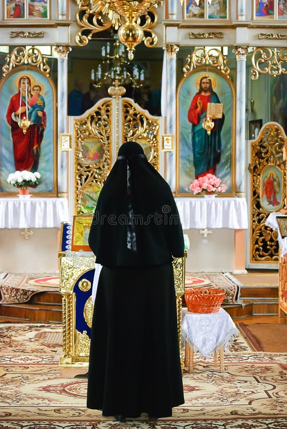 Nun in the church editorial photography. Image of cloth - 15808352
