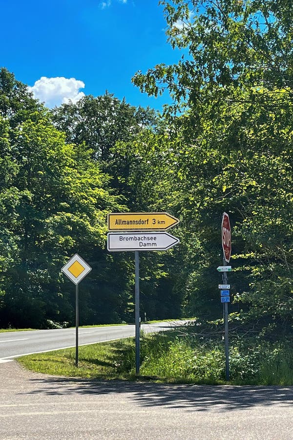 A Directional Sign Standing on the Road Editorial Photography - Image ...