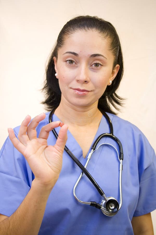 Nurse Holding Anesthesia Mask Stock Image - Image of checkup, brunette ...