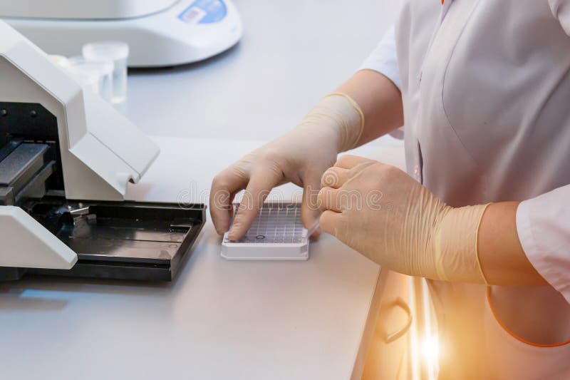Nurse Arranges Test Tubes with on a Tray. Virus Infection Stock Image ...