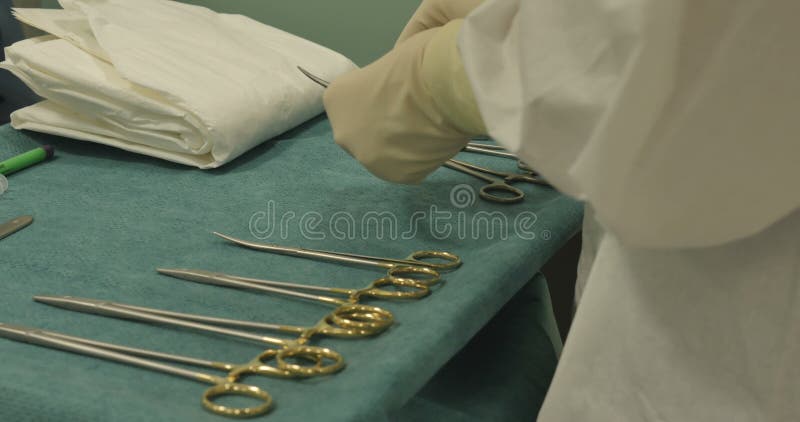 The Nurse Assistant Prepares Medical Instruments , Devices before ...