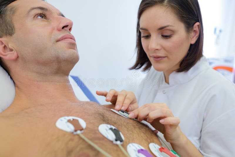 Nurse Attaching Body Monitor Stock Image - Image of healthcare ...