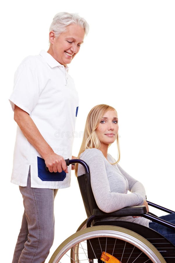 Nurse caring for woman stock image. Image of mobility - 17020921