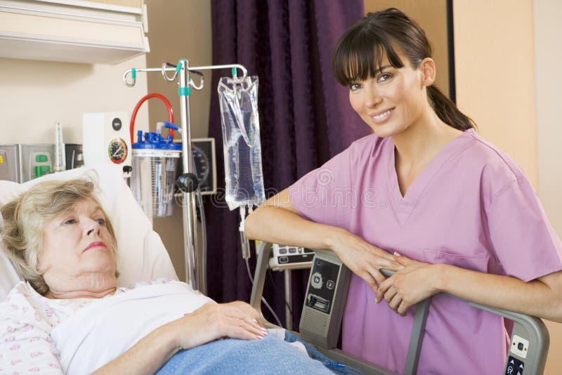 Nurse Checking Up On Patient Stock Image - Image: 6429367