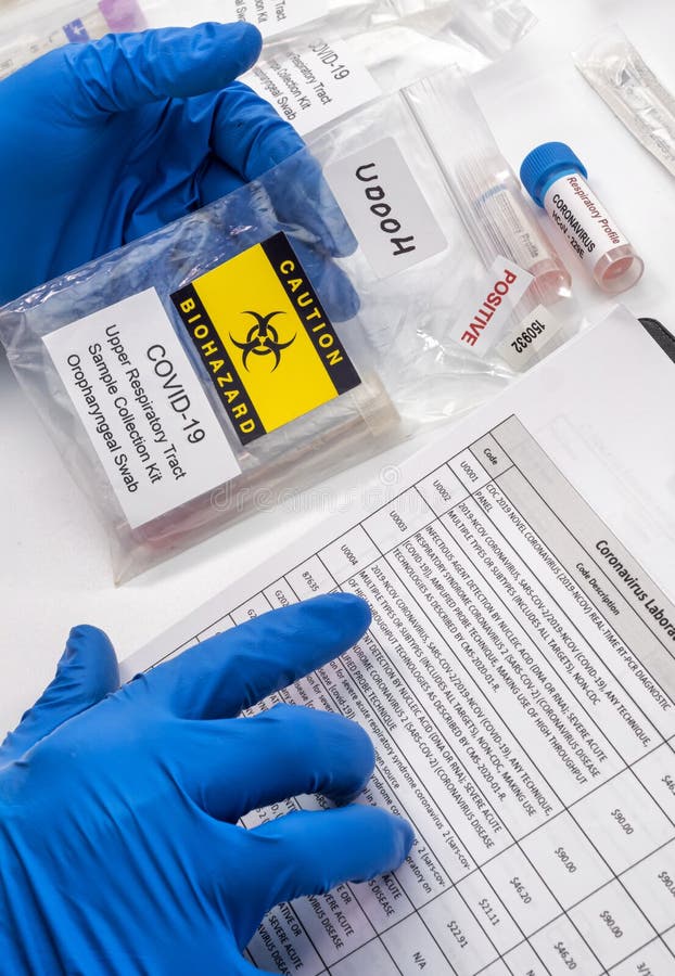 Nurse Comparing Positive Covid-19 Test Results of Infected Persons ...