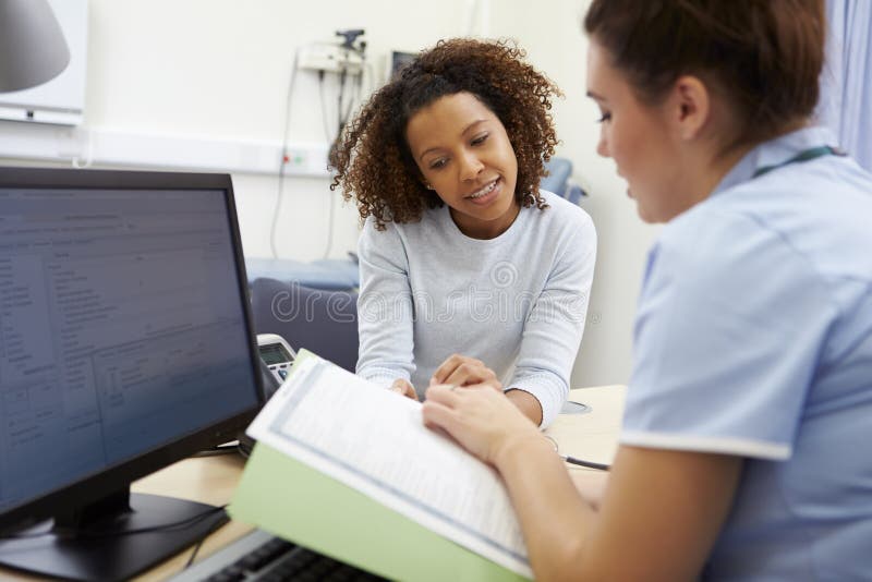 Nurse Discussing Test Results with Patient Stock Photo - Image of ...