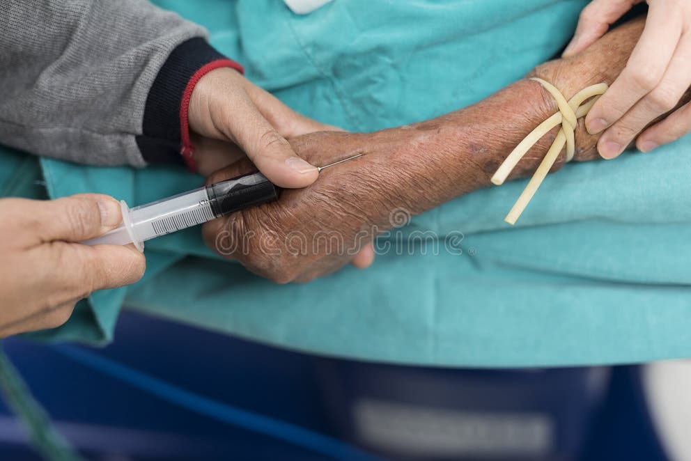 Nurse Drawing Blood from Patient Stock Photo - Image of care, human ...